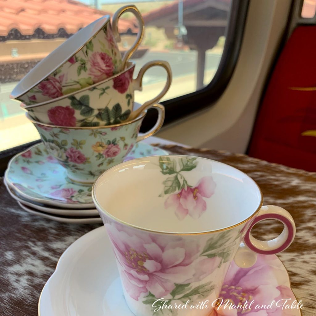 The Traveling Teacup Takes an Exciting Train Ride! - Mantel and Table